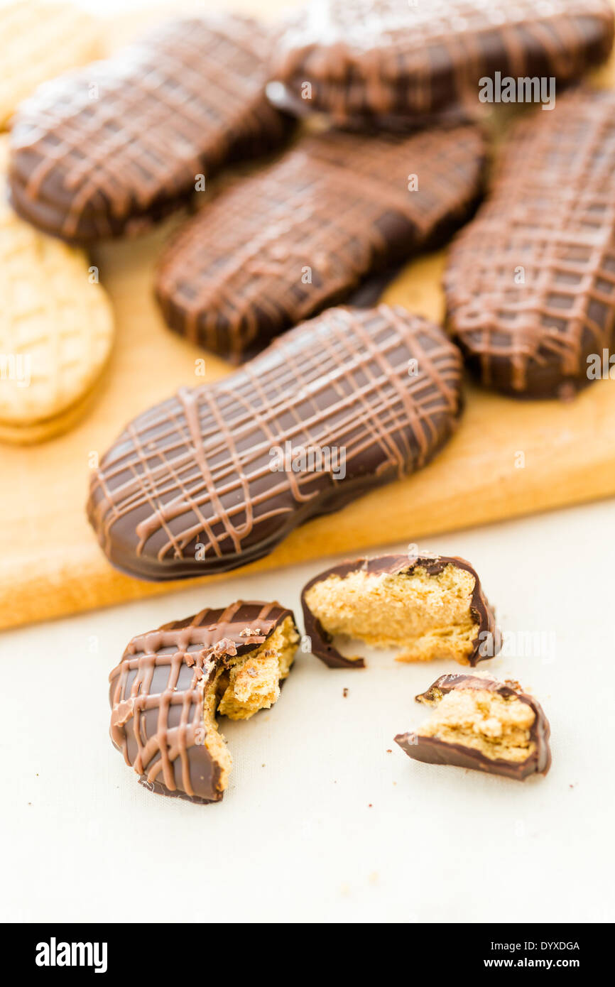 Gourmet Chocolate covered Nutter Butters with chocolate design on top ...