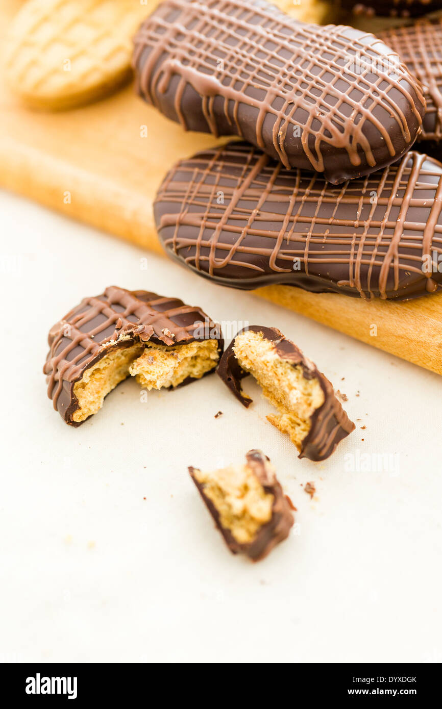 Gourmet Chocolate covered Nutter Butters with chocolate design on top ...