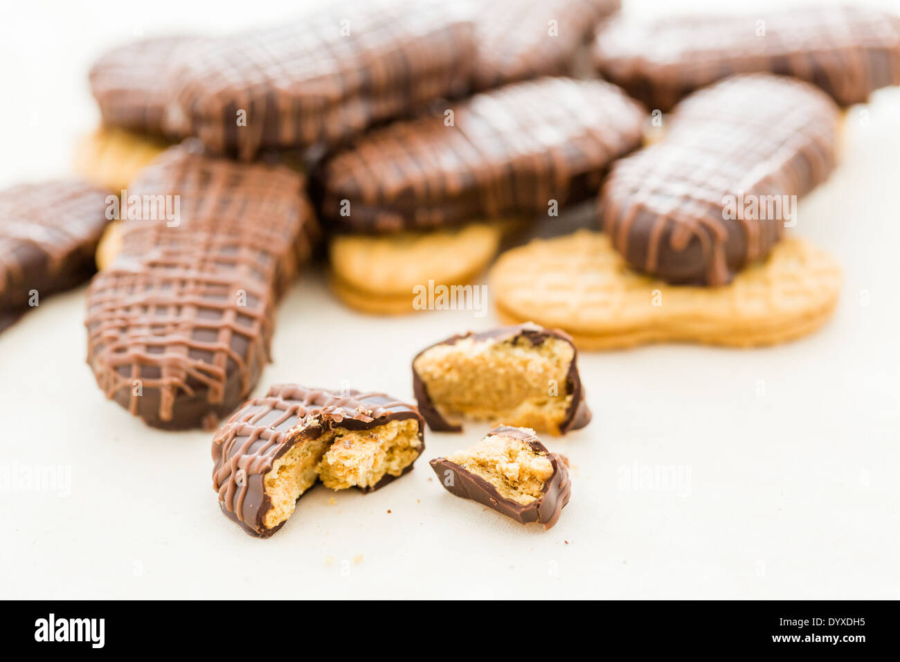 Gourmet Chocolate covered Nutter Butters with chocolate design on top ...