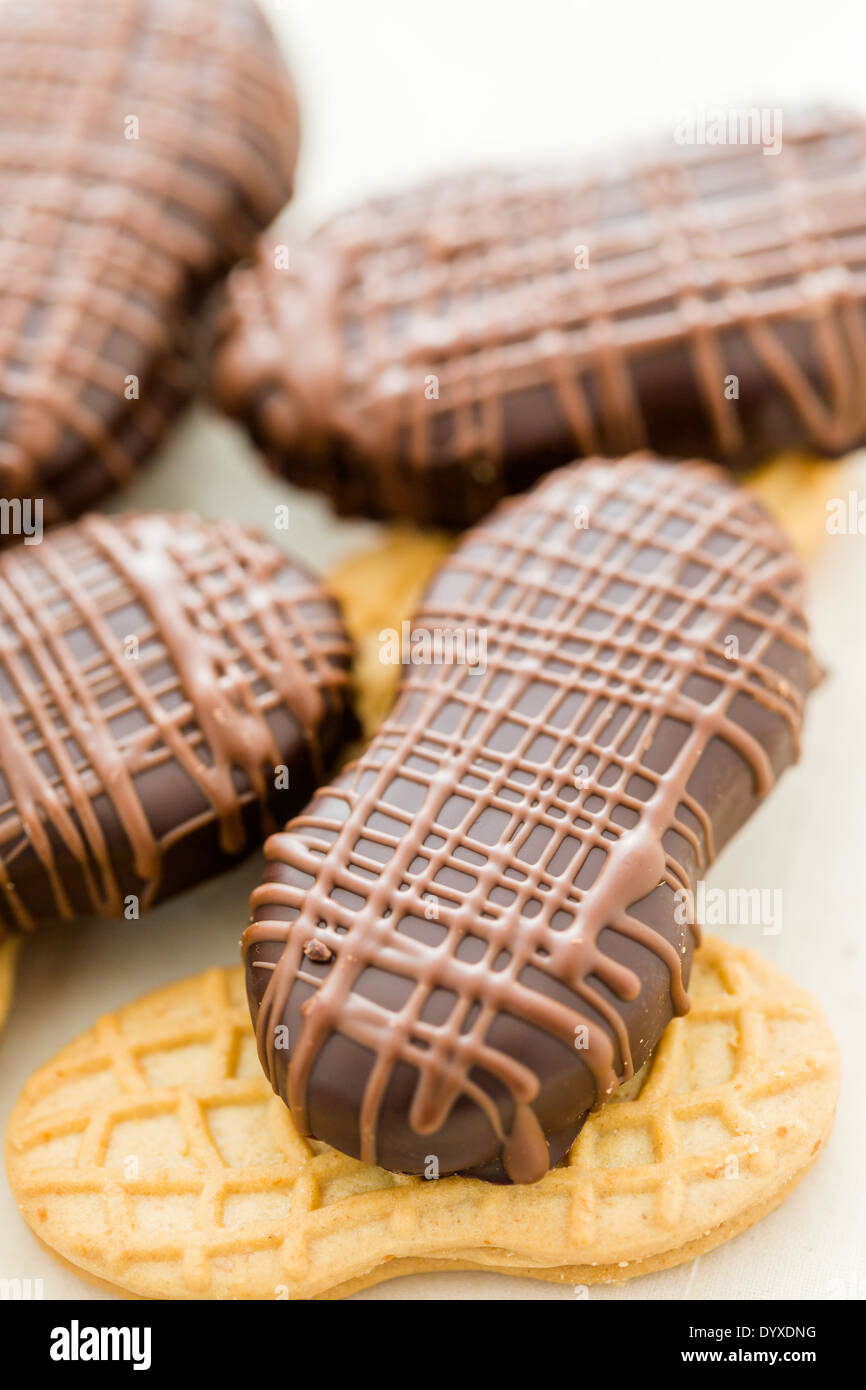 Gourmet Chocolate covered Nutter Butters with chocolate design on top ...