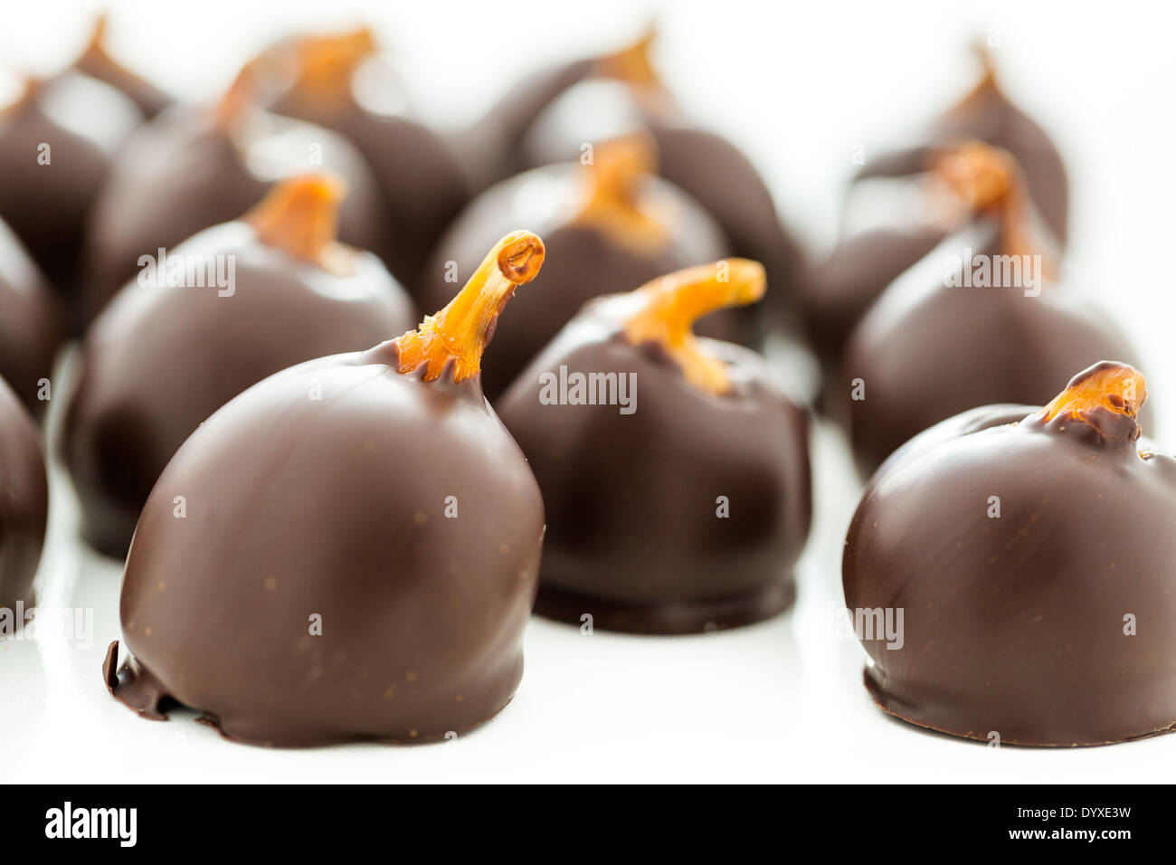 Gourmet chocolate stuffed and dipped dry figs Stock Photo - Alamy