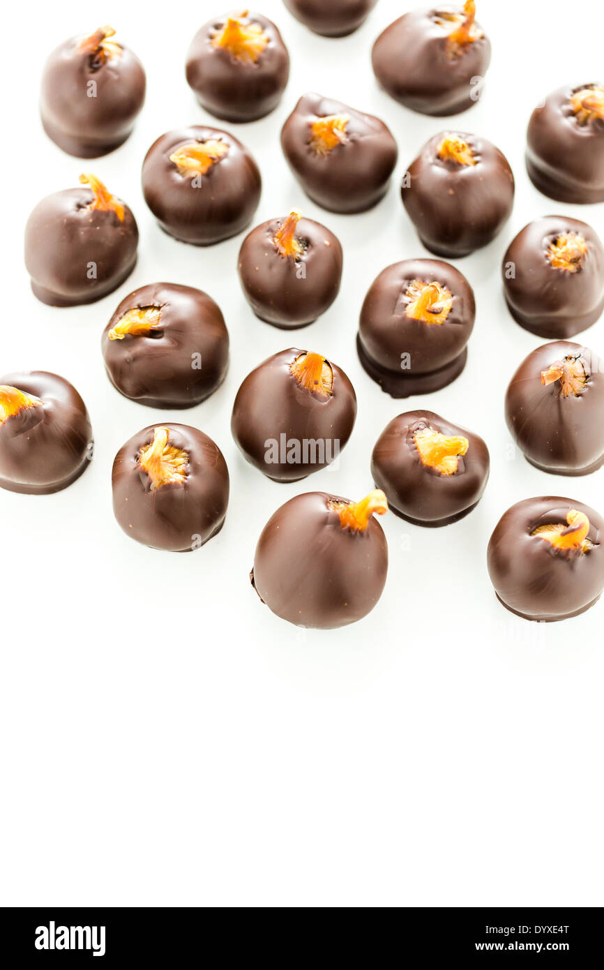 Gourmet chocolate stuffed and dipped dry figs Stock Photo - Alamy