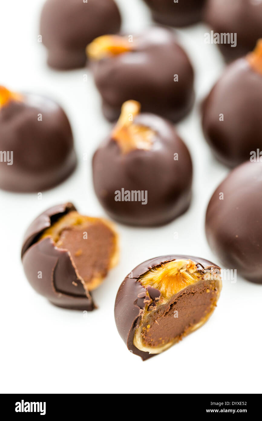 Gourmet chocolate stuffed and dipped dry figs Stock Photo - Alamy