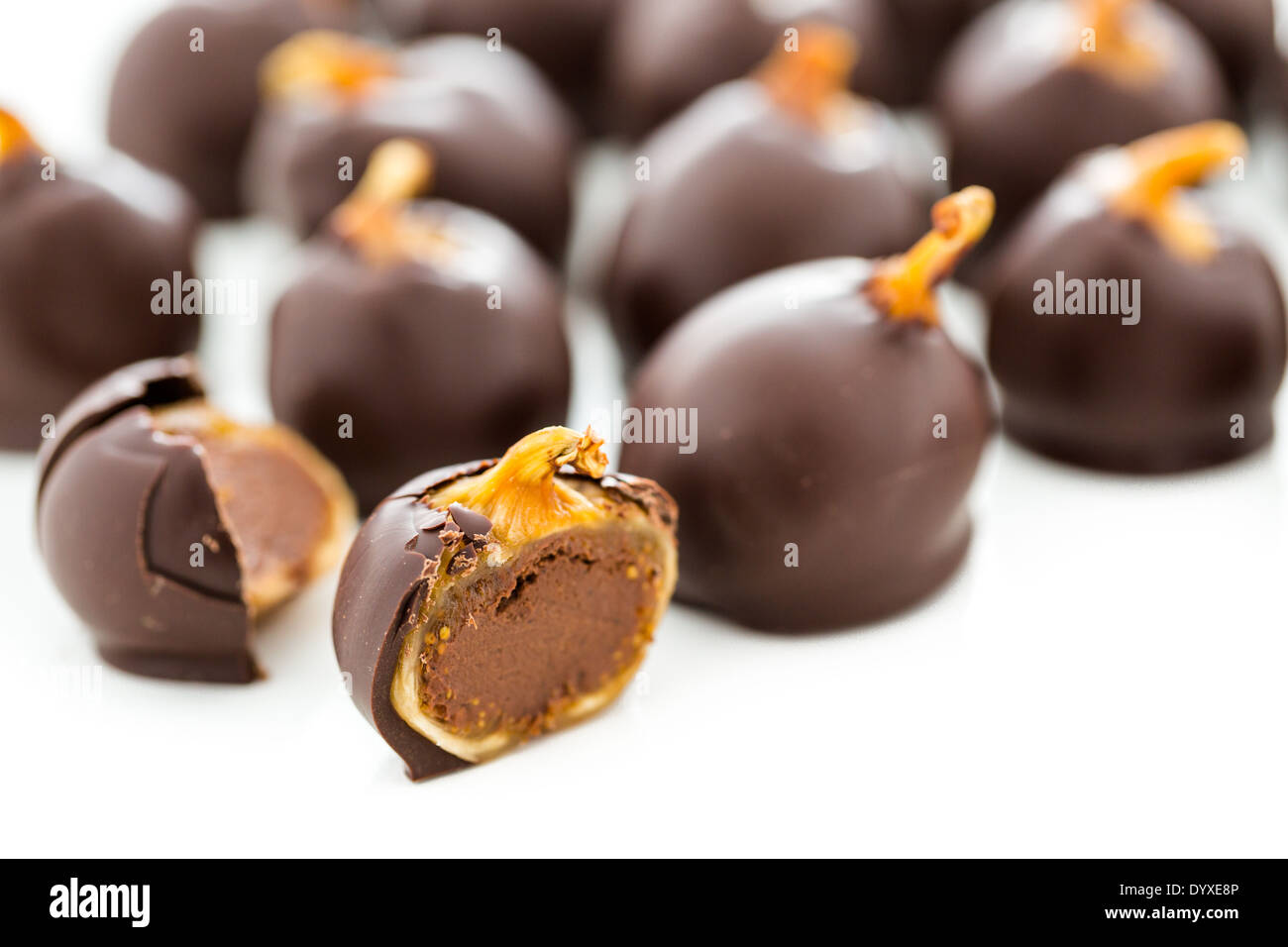 Gourmet chocolate stuffed and dipped dry figs Stock Photo - Alamy