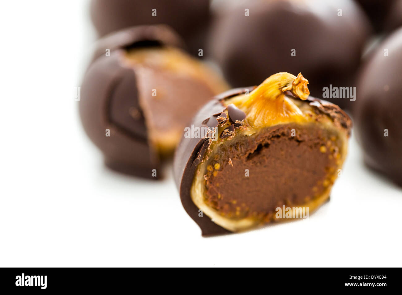Gourmet chocolate stuffed and dipped dry figs Stock Photo - Alamy