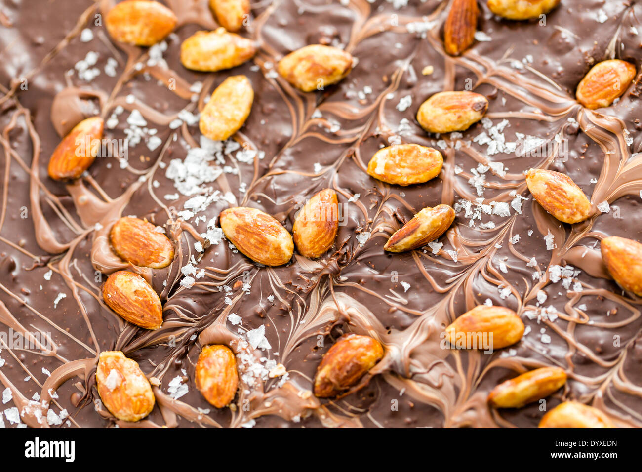 Gourmet slab of Almond Bark on a white background Stock Photo - Alamy