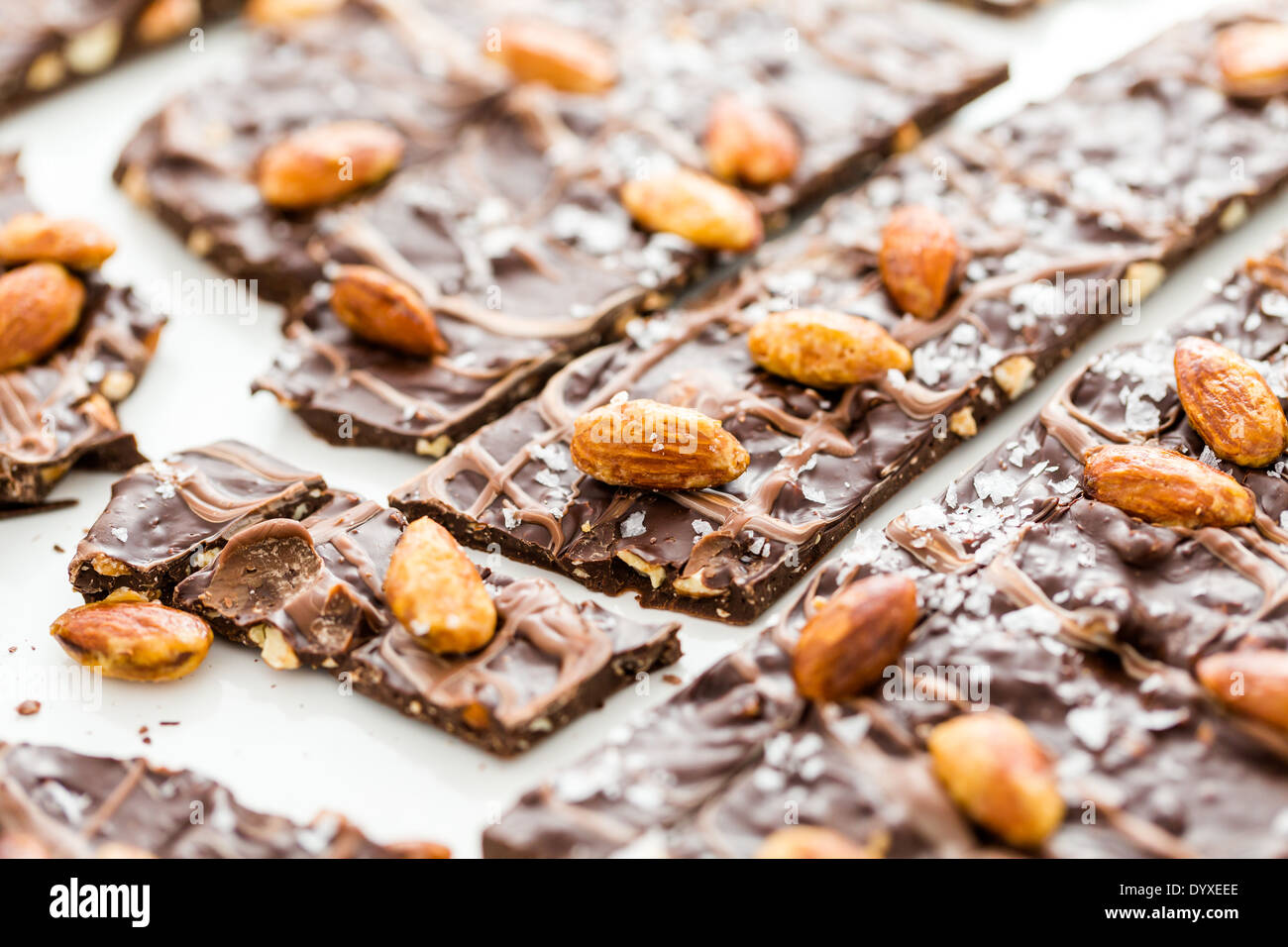 Gourmet slab of Almond Bark on a white background Stock Photo - Alamy