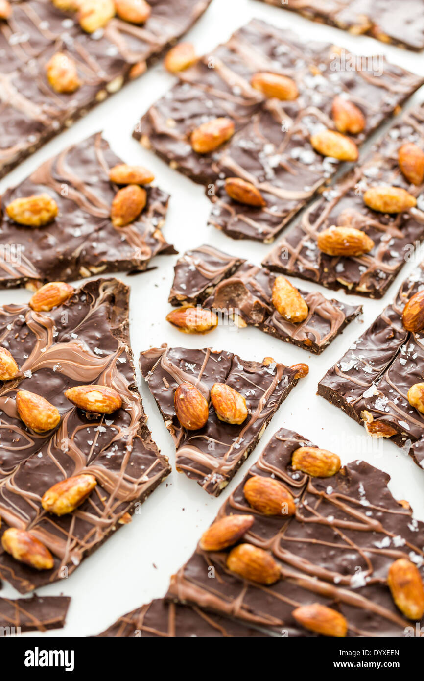 Gourmet slab of Almond Bark on a white background Stock Photo - Alamy