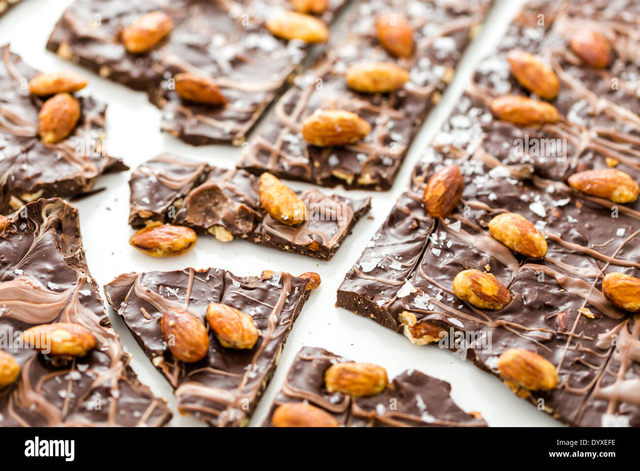 Gourmet slab of Almond Bark on a white background Stock Photo - Alamy