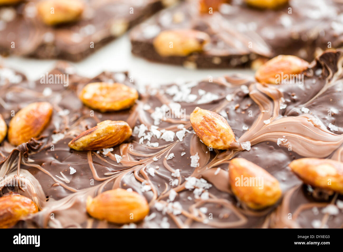 Gourmet slab of Almond Bark on a white background Stock Photo - Alamy