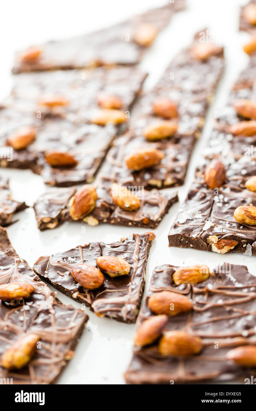 Gourmet slab of Almond Bark on a white background Stock Photo - Alamy
