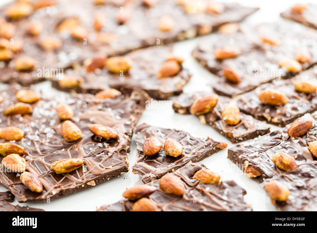 Gourmet slab of Almond Bark on a white background Stock Photo - Alamy