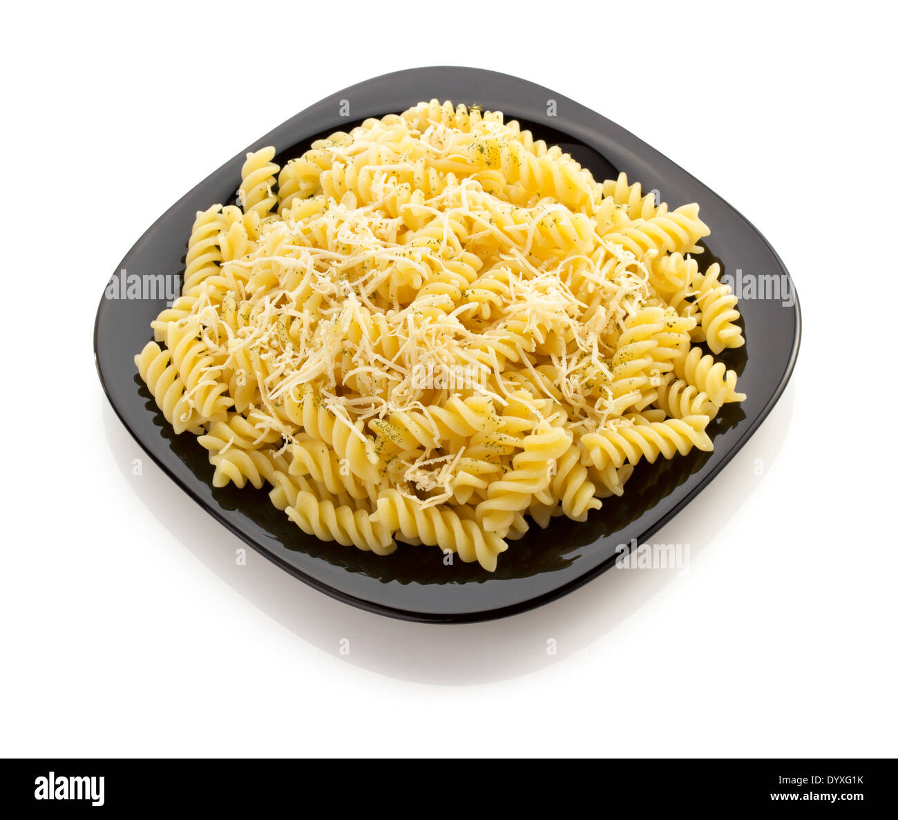 pasta fusilli in plate isolated on white background Stock Photo - Alamy