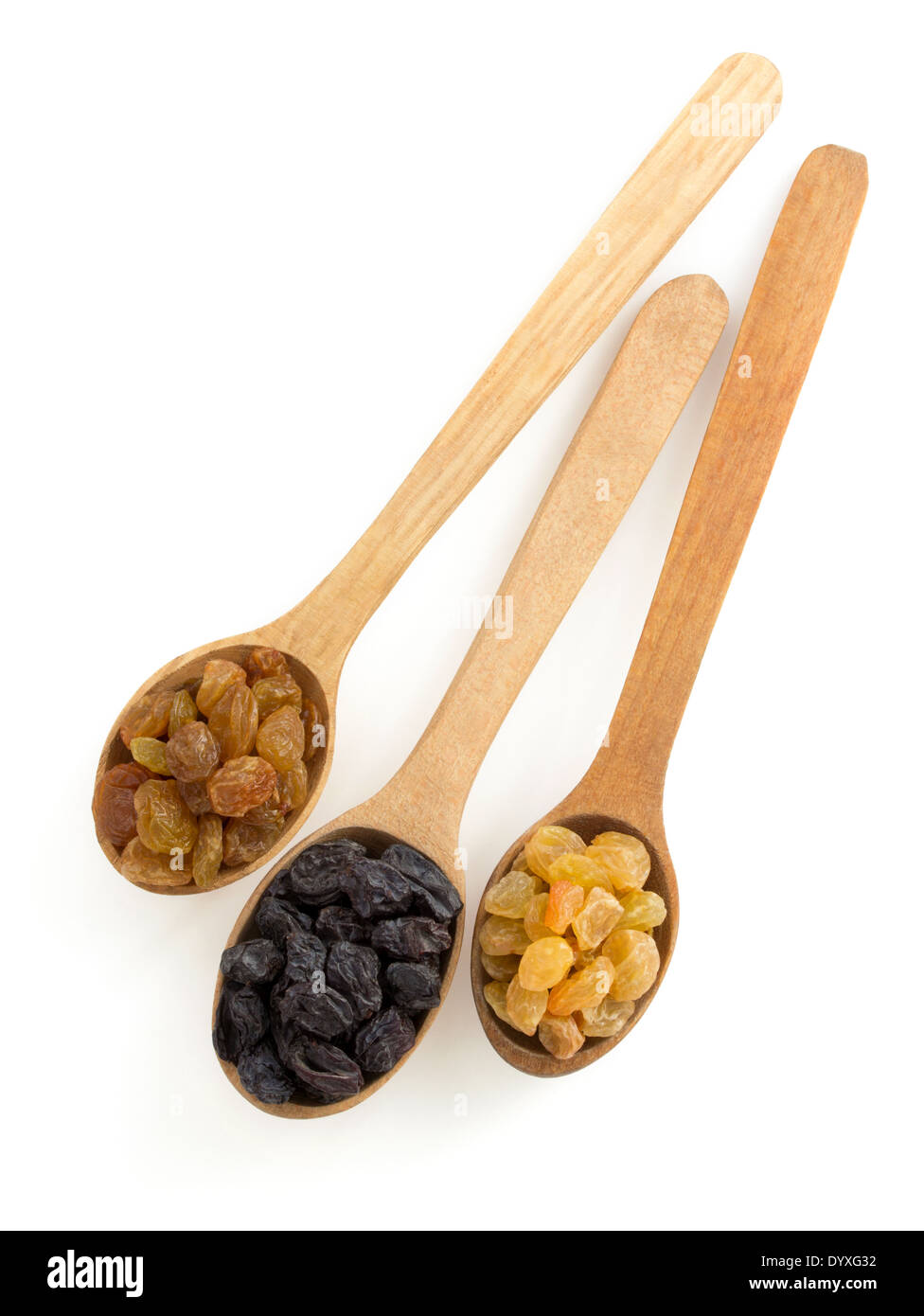 raisins fruit in spoon on white background Stock Photo - Alamy