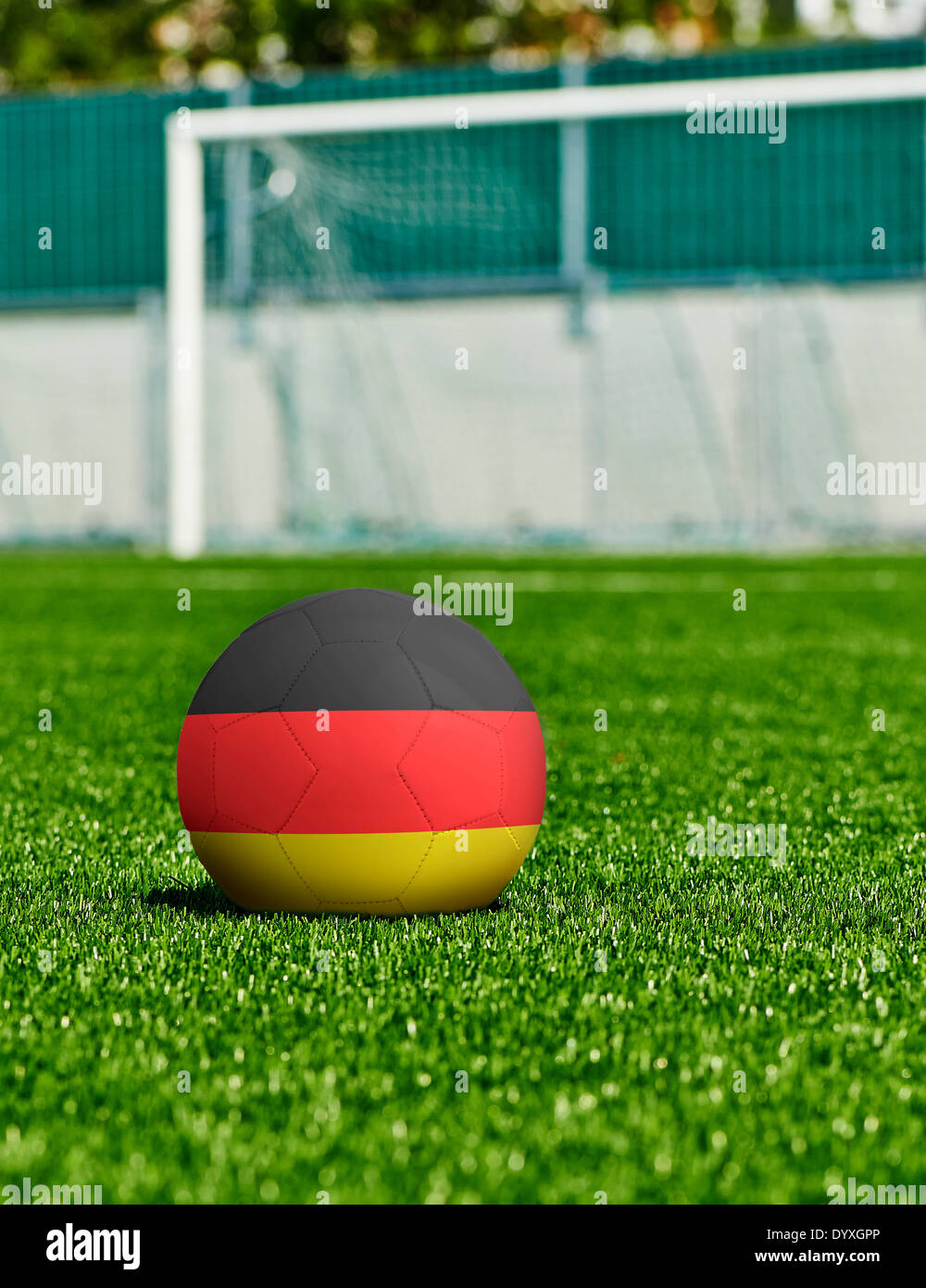 Soccer Ball with Germany Flag on the grass in stadium Stock Photo - Alamy