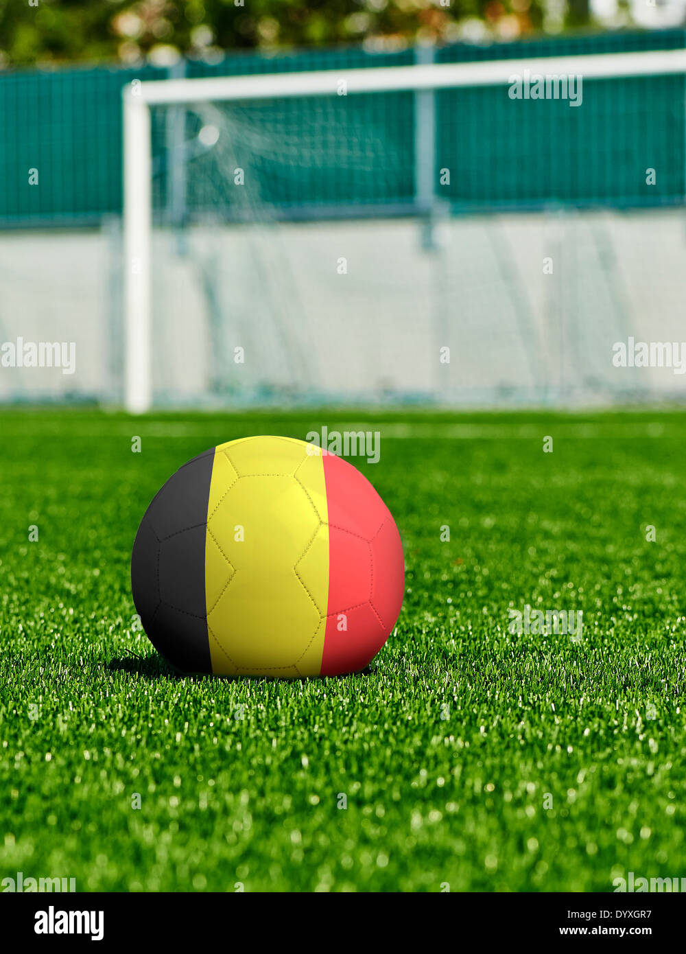 Soccer Ball with Belgium Flag on the grass in stadium Stock Photo - Alamy