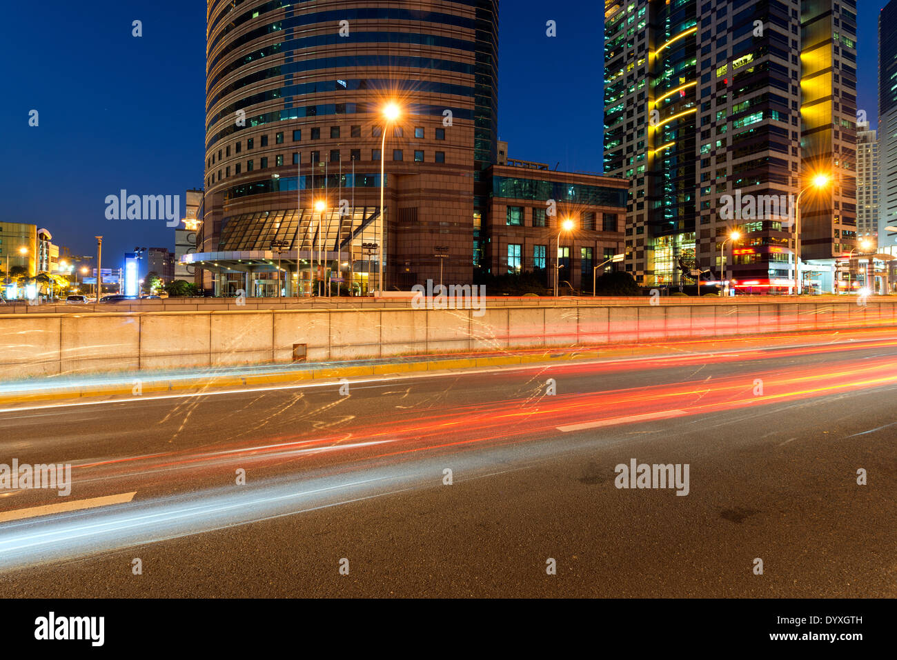 Urban city at night with traffic and night skyline Stock Photo - Alamy