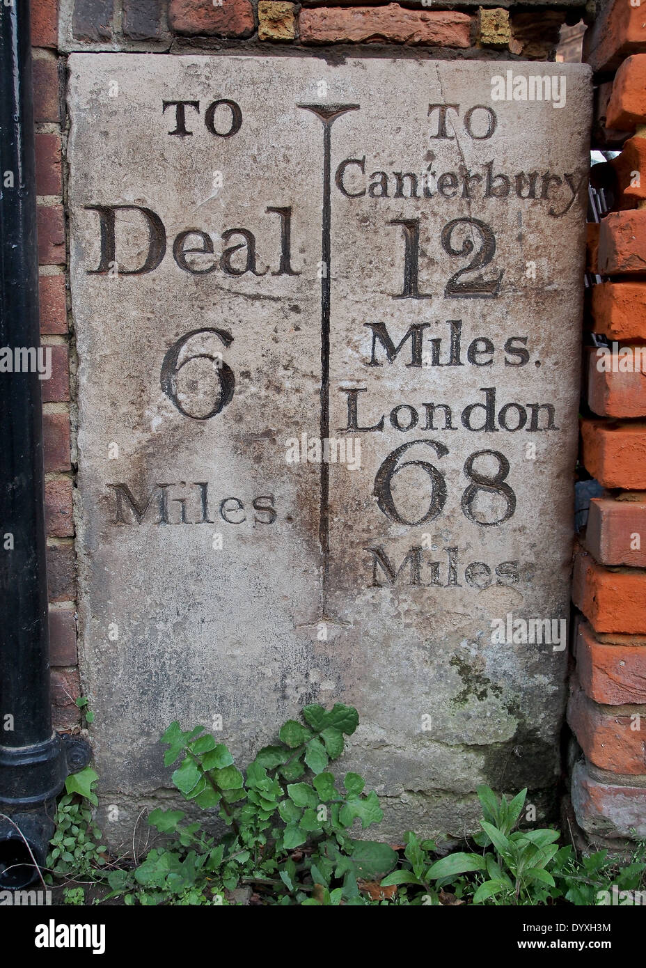 Old Stone Sign showing distance from Deal to London Stock Photo - Alamy
