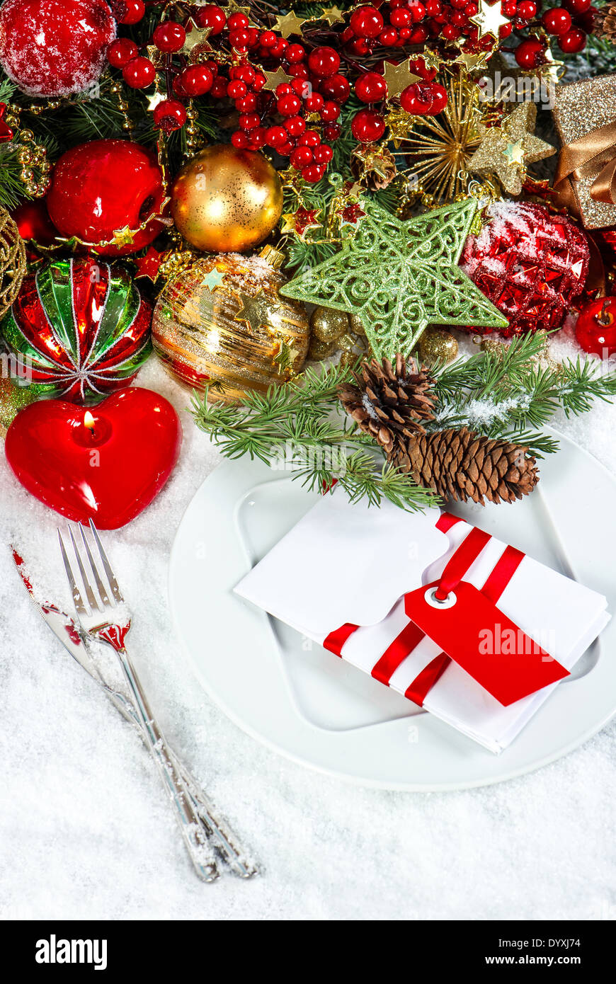 christmas table place setting decoration with red heart shaped candle ...