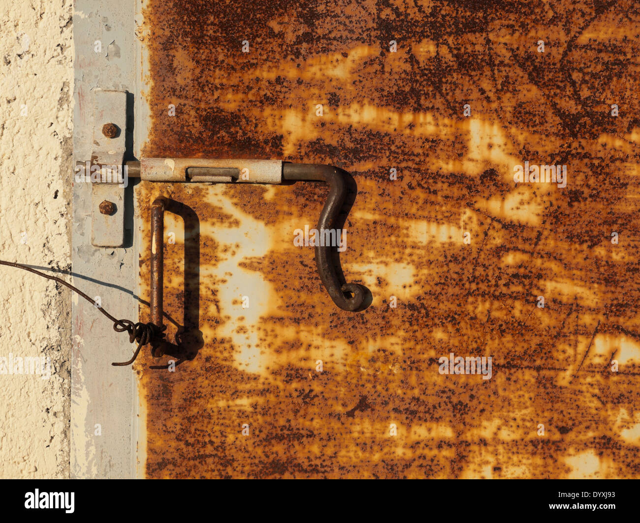 Old rusty door with rusted handle Stock Photo - Alamy