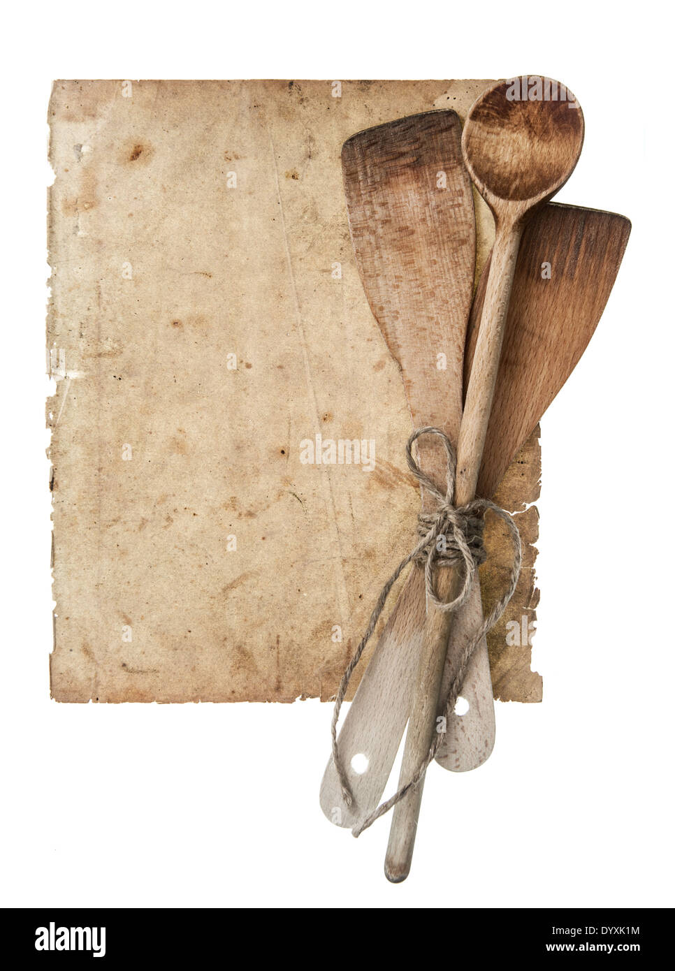 Retro kitchen utensils and old cook book page isolated on white ...