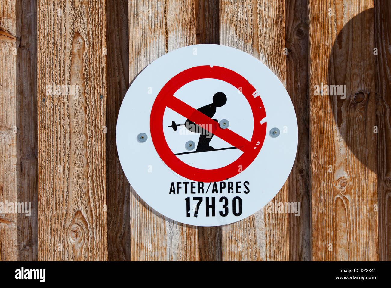 No skiing sign on a wooden wall in a ski resort in France Stock Photo ...