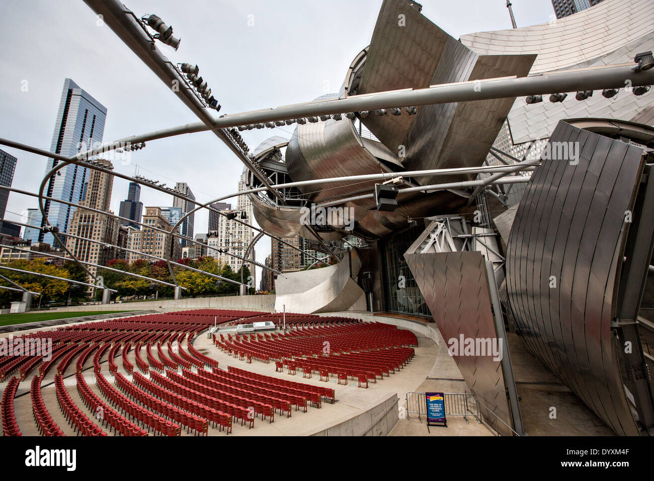 Jay Pritzker Pavilion with downtown skyline at Millennium Park in ...