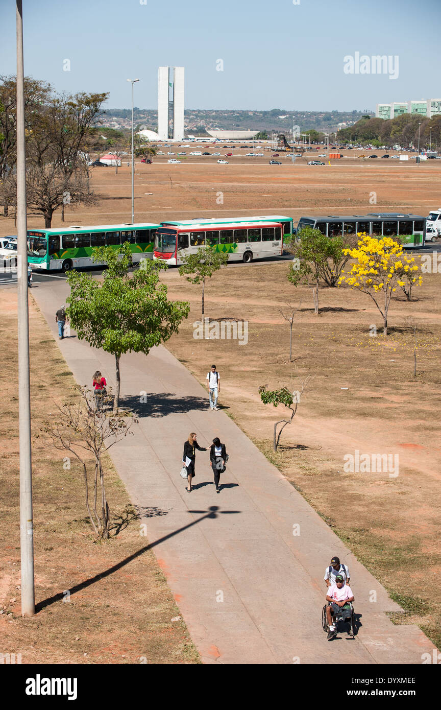 Brasilia, Brazil. People going to work on path to Ministries and ...