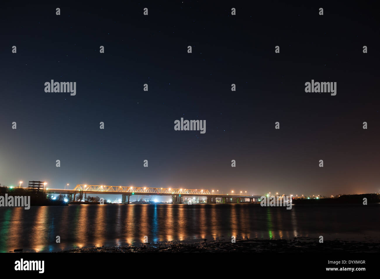 Night bridge and reflections Stock Photo - Alamy