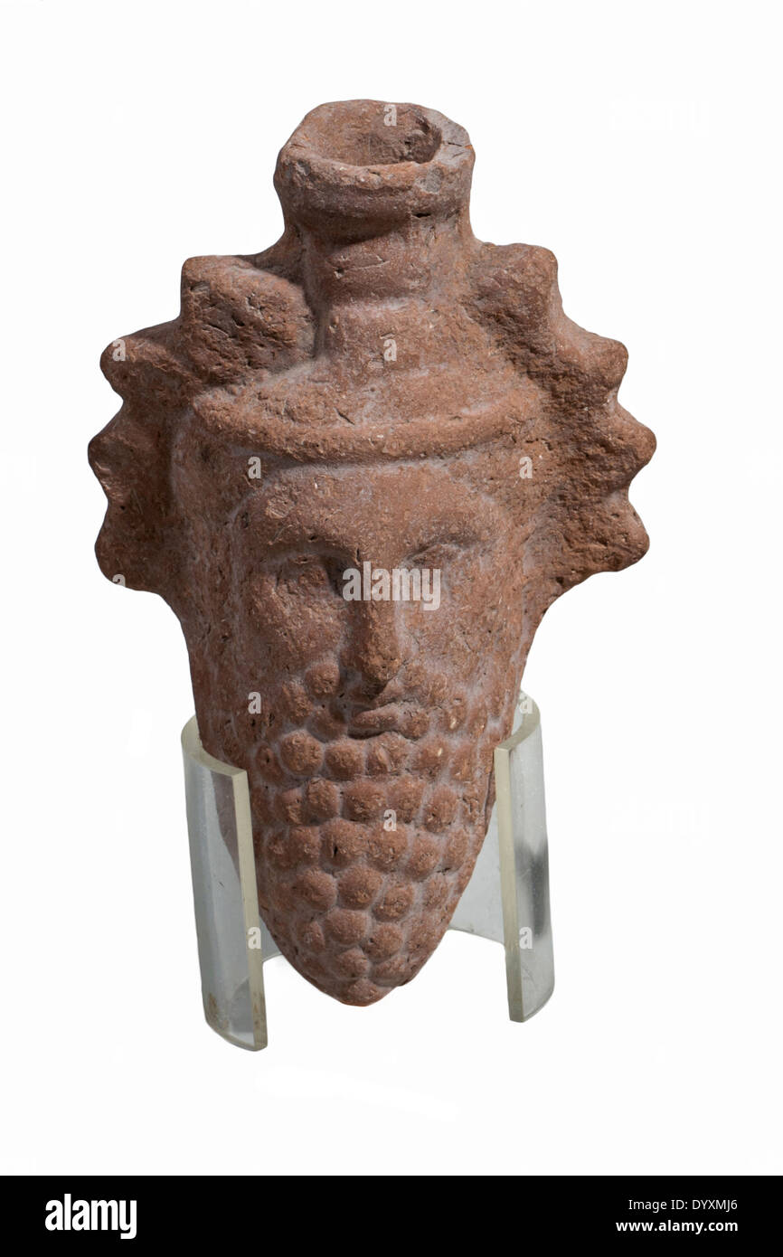 A terra-cotta Dionysus head flask. Hellenistic Egypt, Fayium 3rd-1at ...