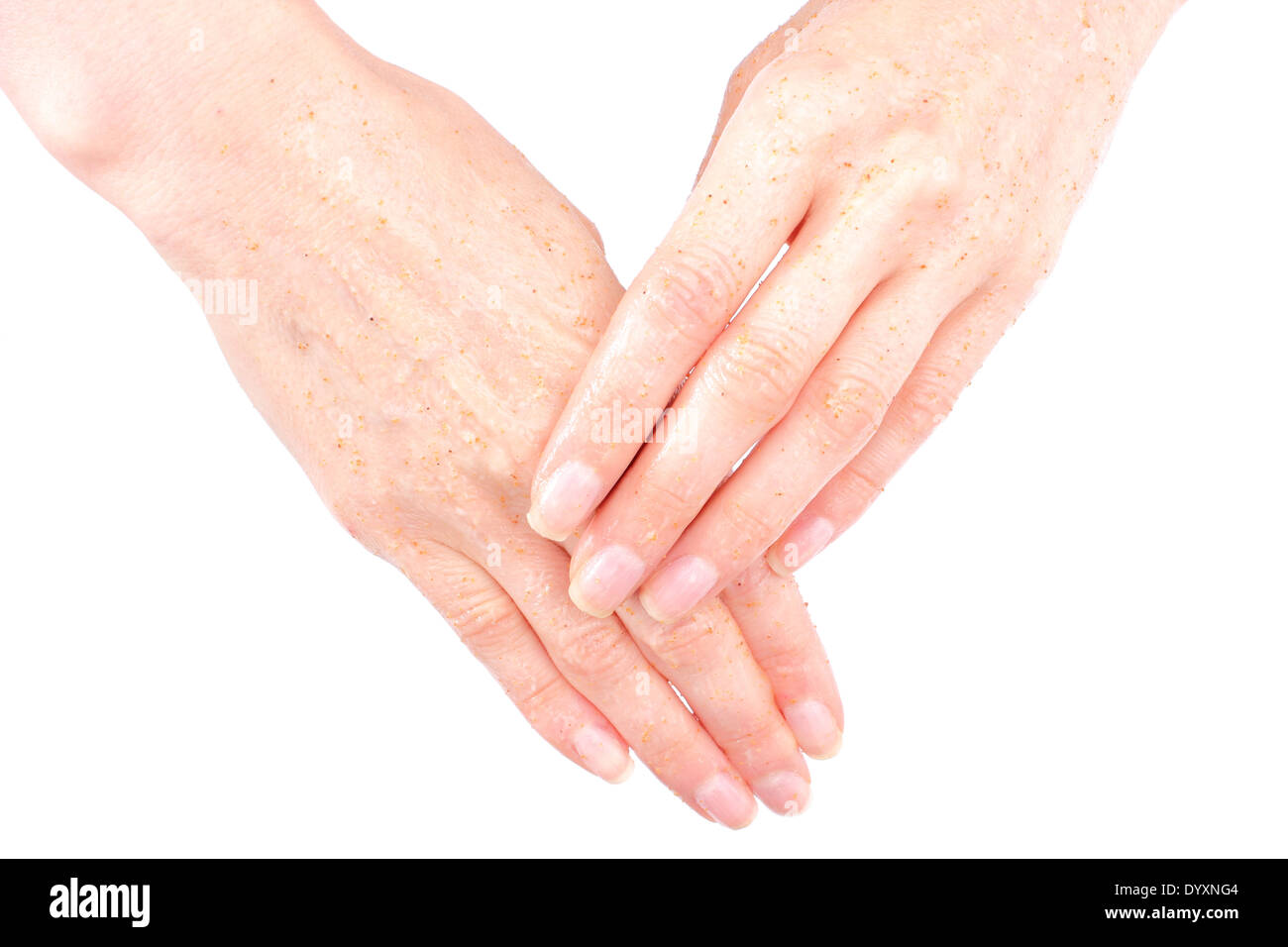 Hand of woman puts a cosmetic cream, peeling hand, isolated on white ...