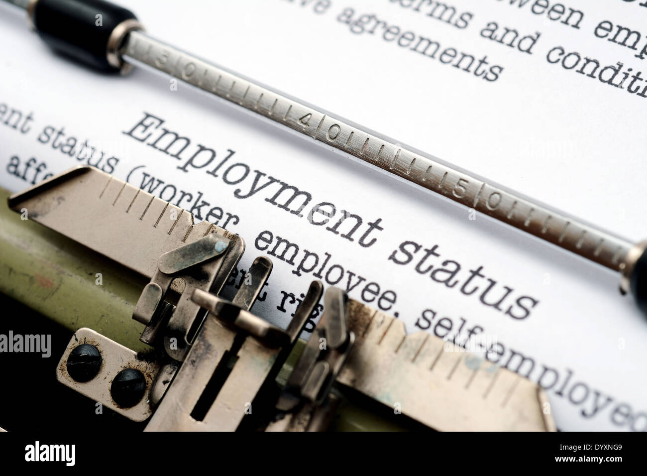 Employment status text on typewriter Stock Photo - Alamy