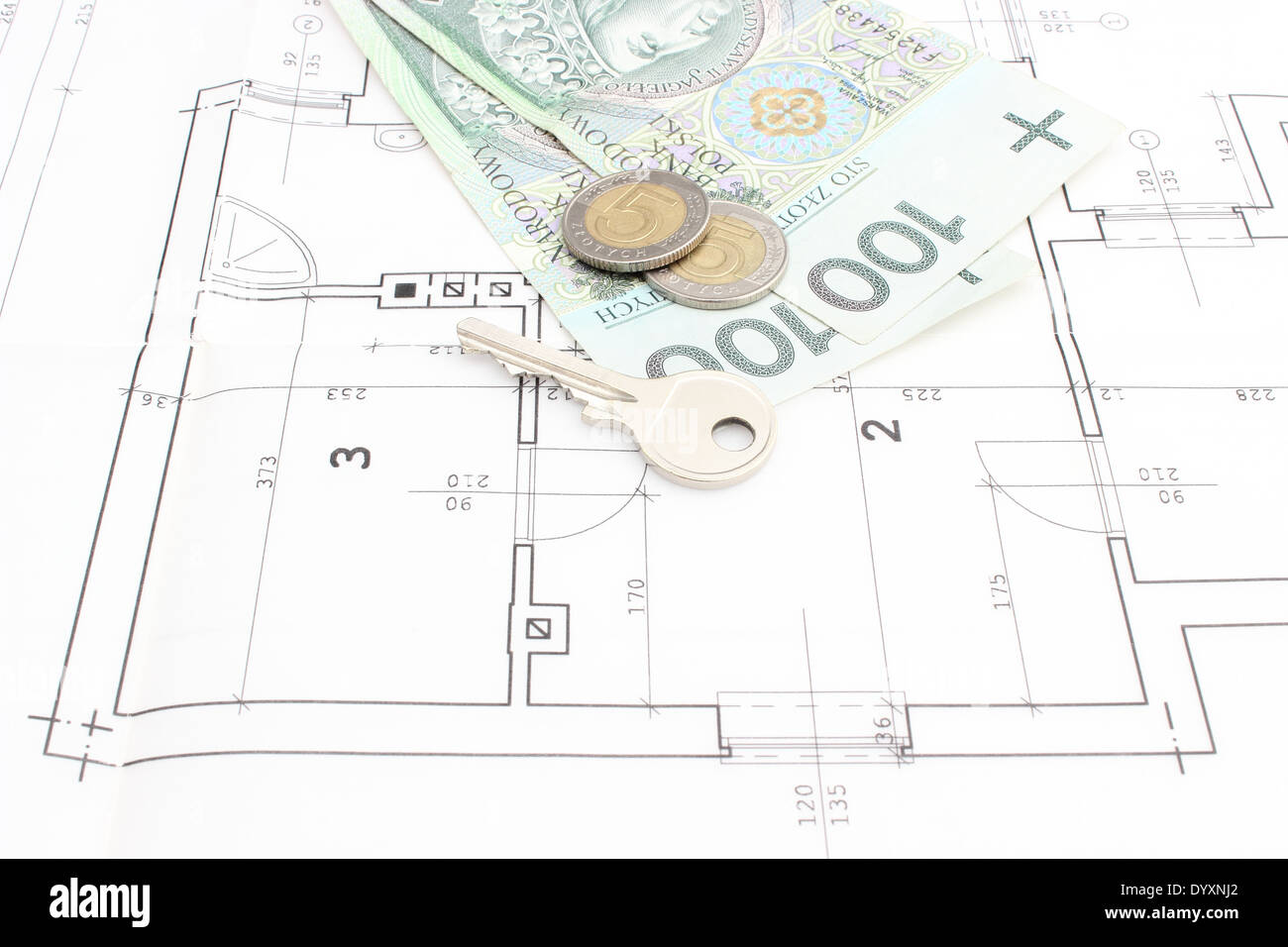 Money and key lying on construction drawing of house Stock Photo - Alamy