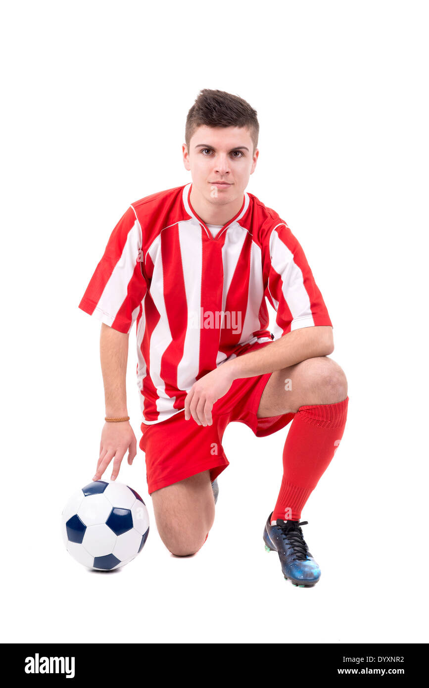 Football player with a ball isolated in white Stock Photo - Alamy