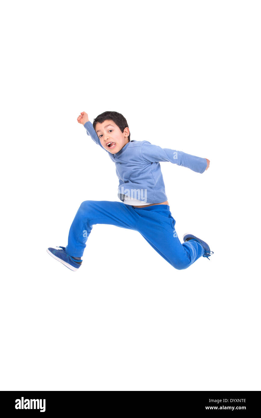 Young boy jumping isolated in white Stock Photo - Alamy