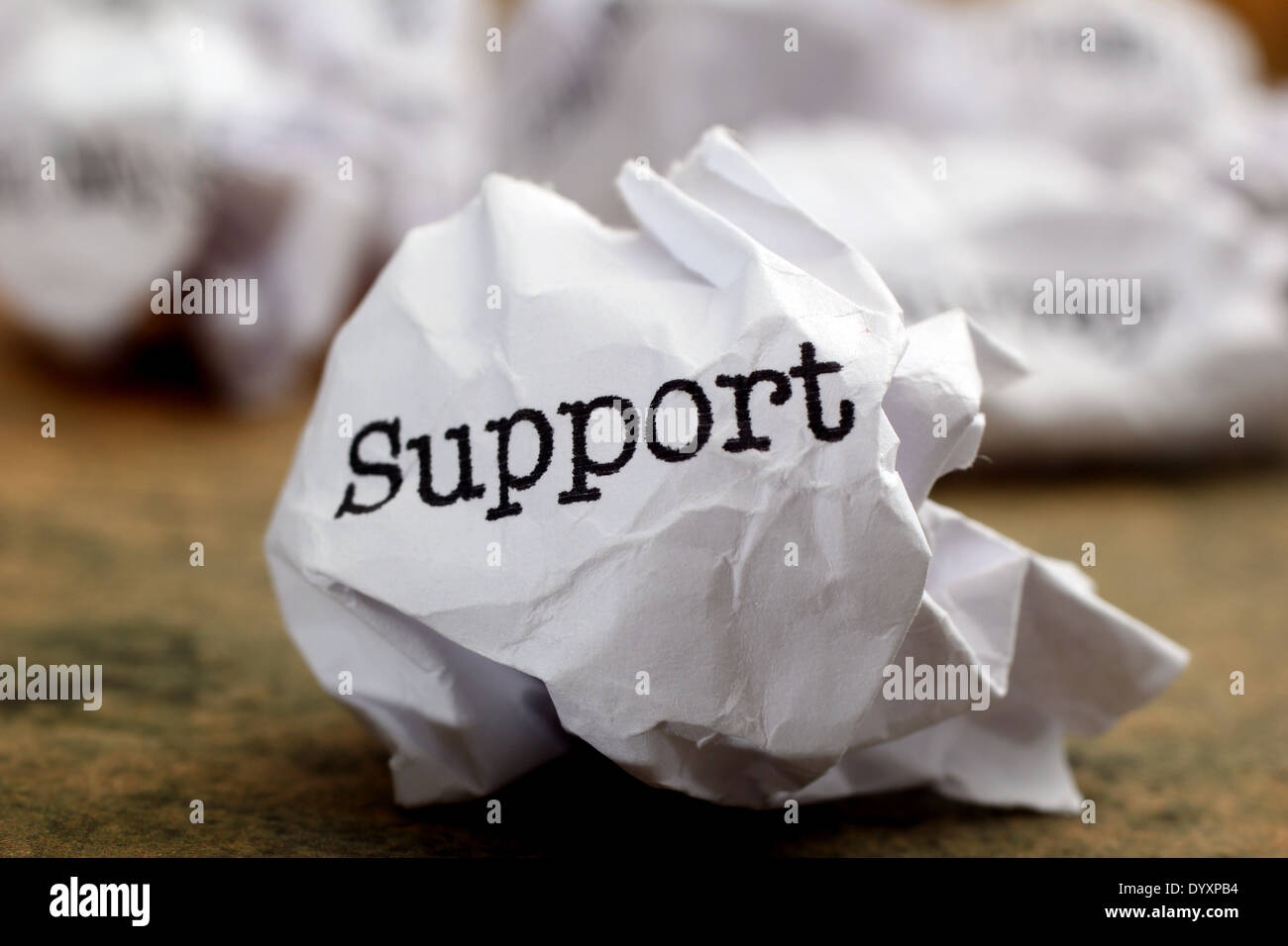 Support text on paper Stock Photo - Alamy