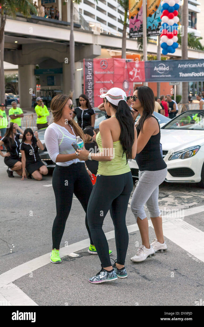 Women runners talking before the 2014 Mercedes-Benz Corporate Run in ...