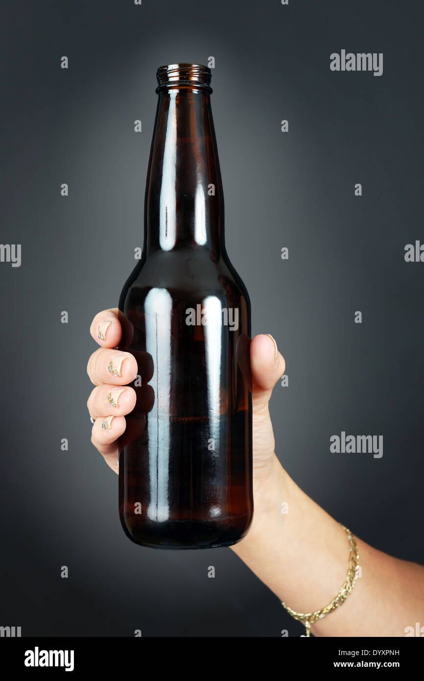 Woman hand holding bottle beer hi-res stock photography and images - Alamy