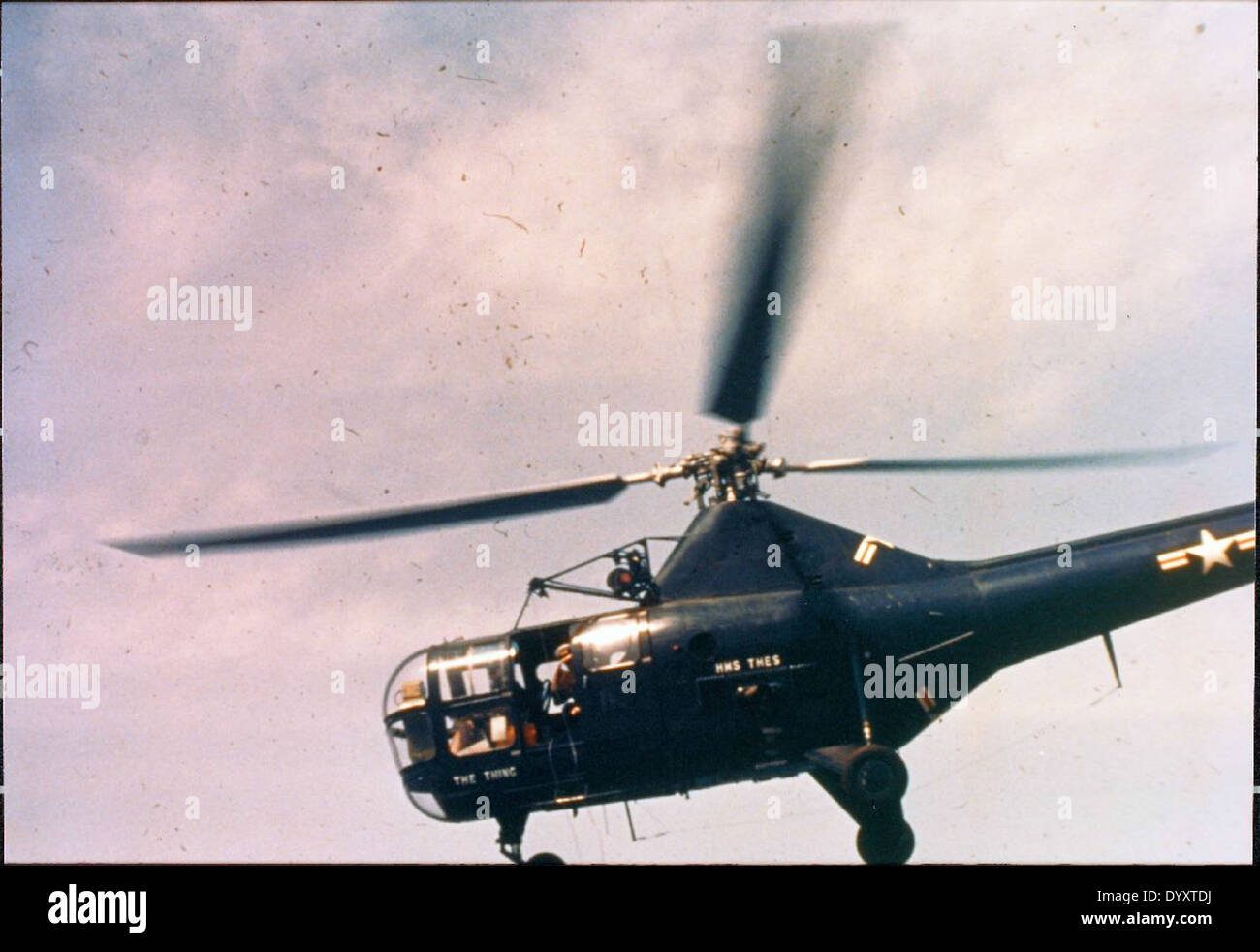 This photo shows a HO3S-1 helicopter departing from the USS Manchester ...
