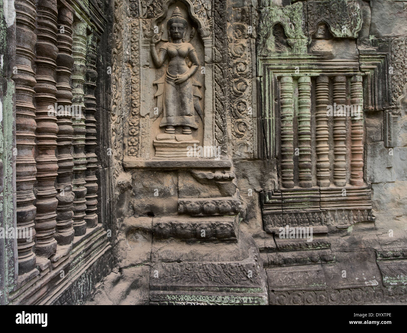 Bas-relief sandstone carvings of Apsara at Ta Prohm temple ruin in the ...