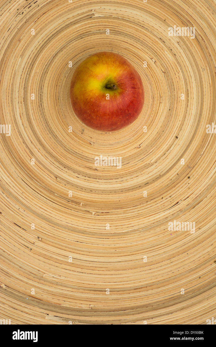 Still Life / Concept / Pattern - an Apple on a patterned wooden bowl ...