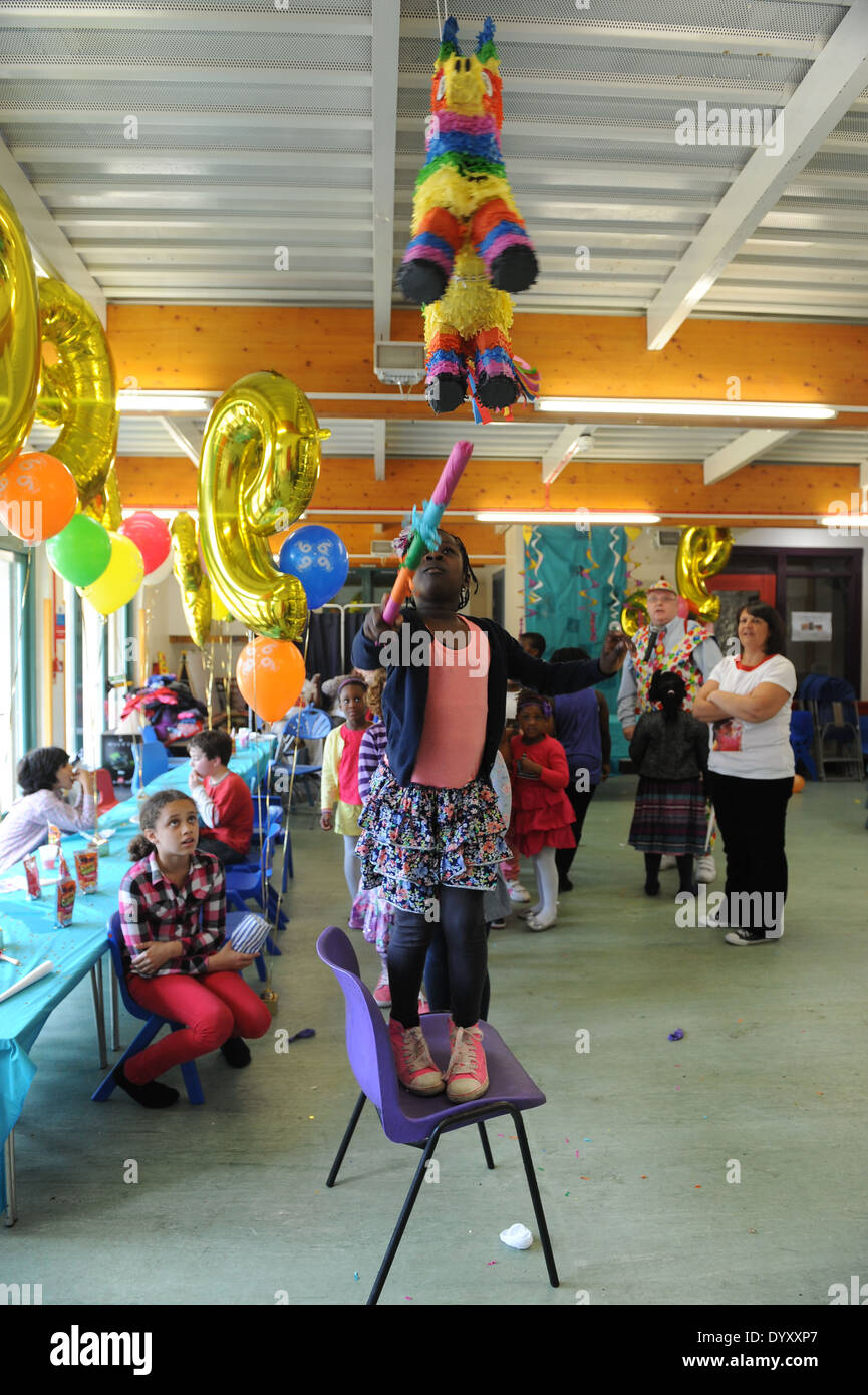 pinata being smashed at a 9th birthday party in London Stock Photo - Alamy