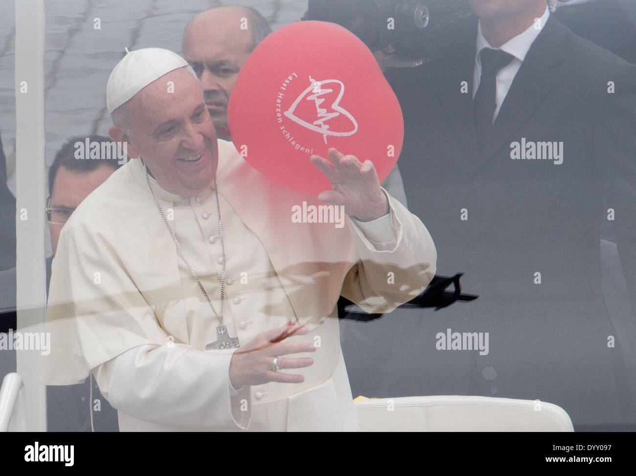 St Peter's Square, Vatican City. 27th Apr, 2014. Pope Francis catches a ...