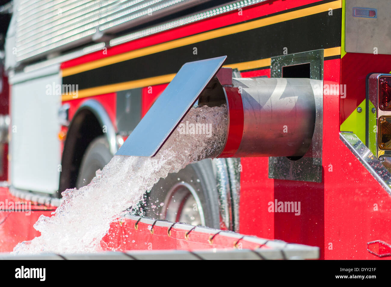 Fire department tanker truck filling a drop tank Stock Photo - Alamy