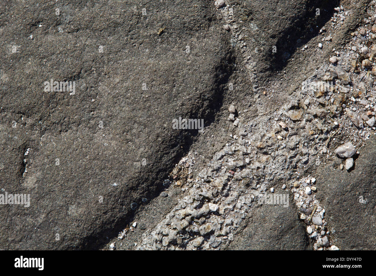 Rock wall pattern with letter X Stock Photo - Alamy