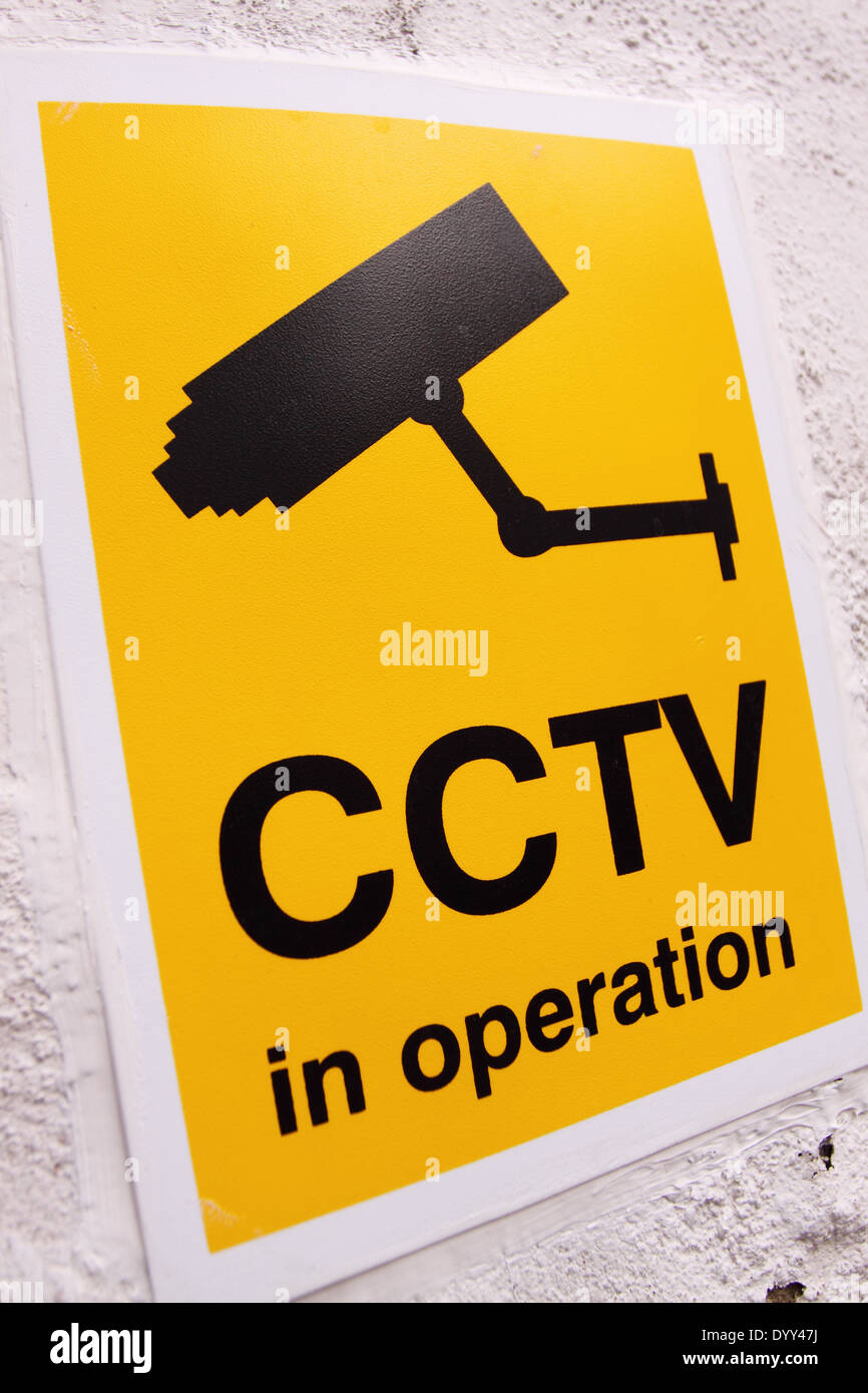 CCTV security camera in operation sign Stock Photo - Alamy