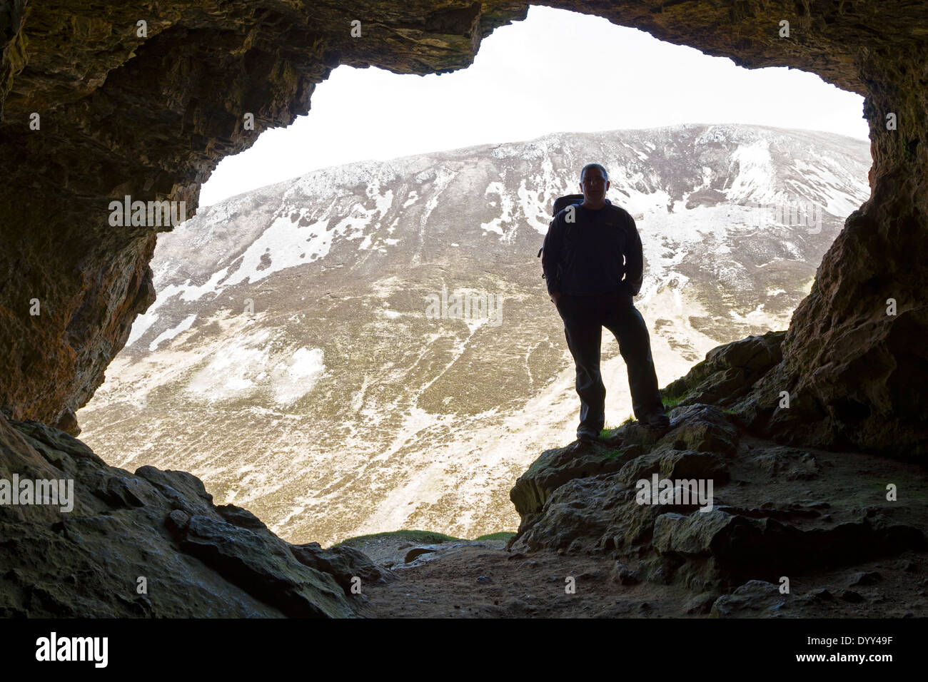 Walker Framed in the Entrance to the Inchnadamph Bone Caves Allt nan ...
