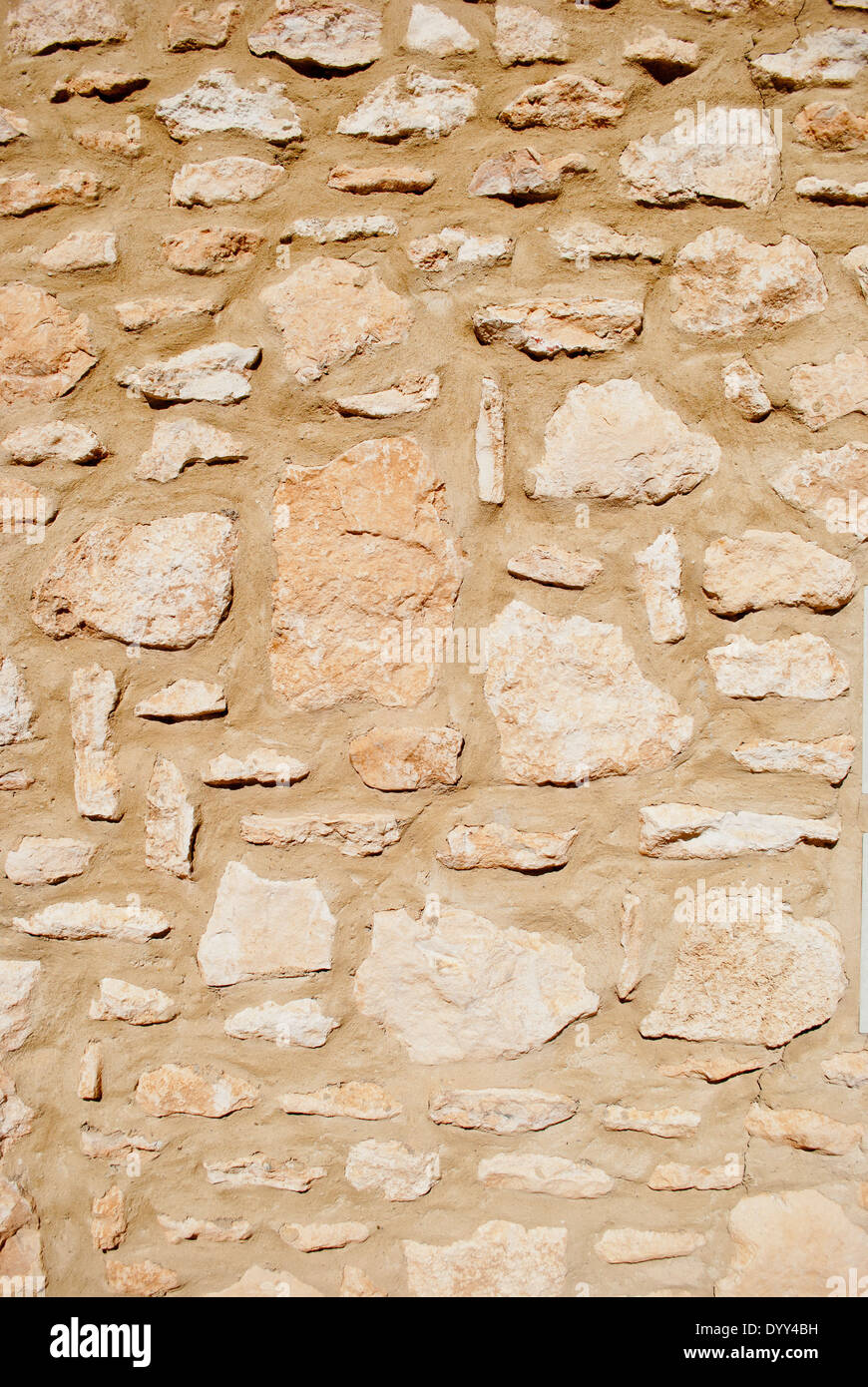 Texture of an old stone wall vertical Stock Photo - Alamy