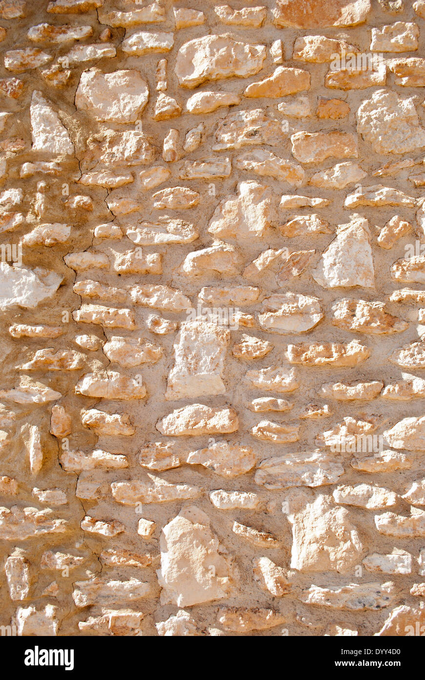Texture of an old stone wall vertical Stock Photo - Alamy