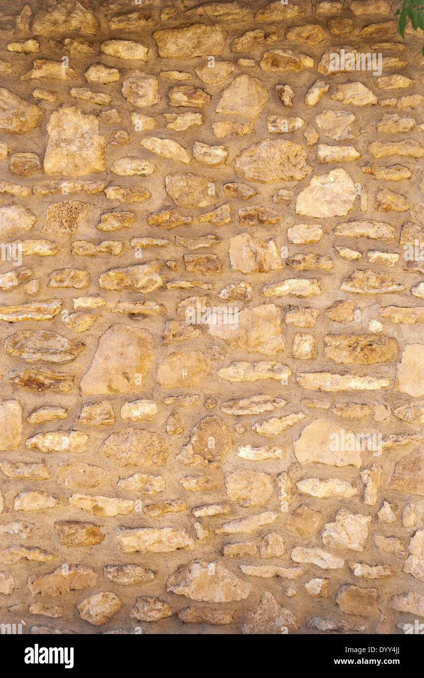 Texture of an old stone wall vertical Stock Photo - Alamy